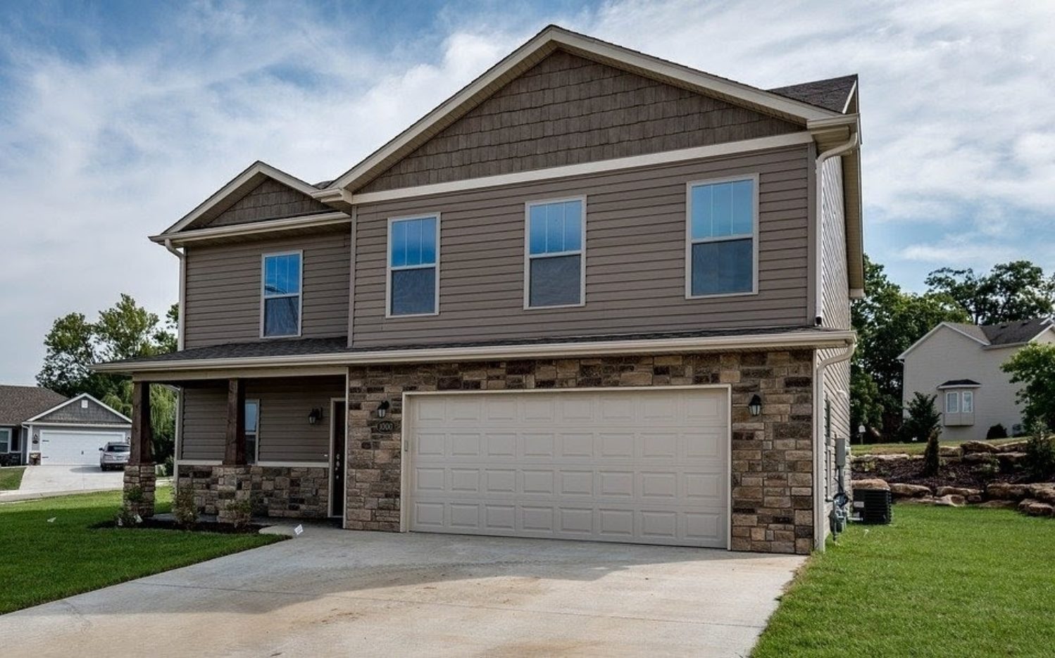 9 Home Designs with Pewter Siding Colors | Allura USA