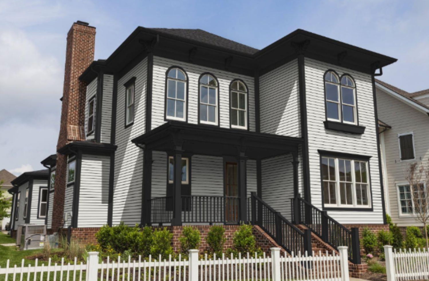 Enhancing a White Farmhouse with Black Windows | Allura USA